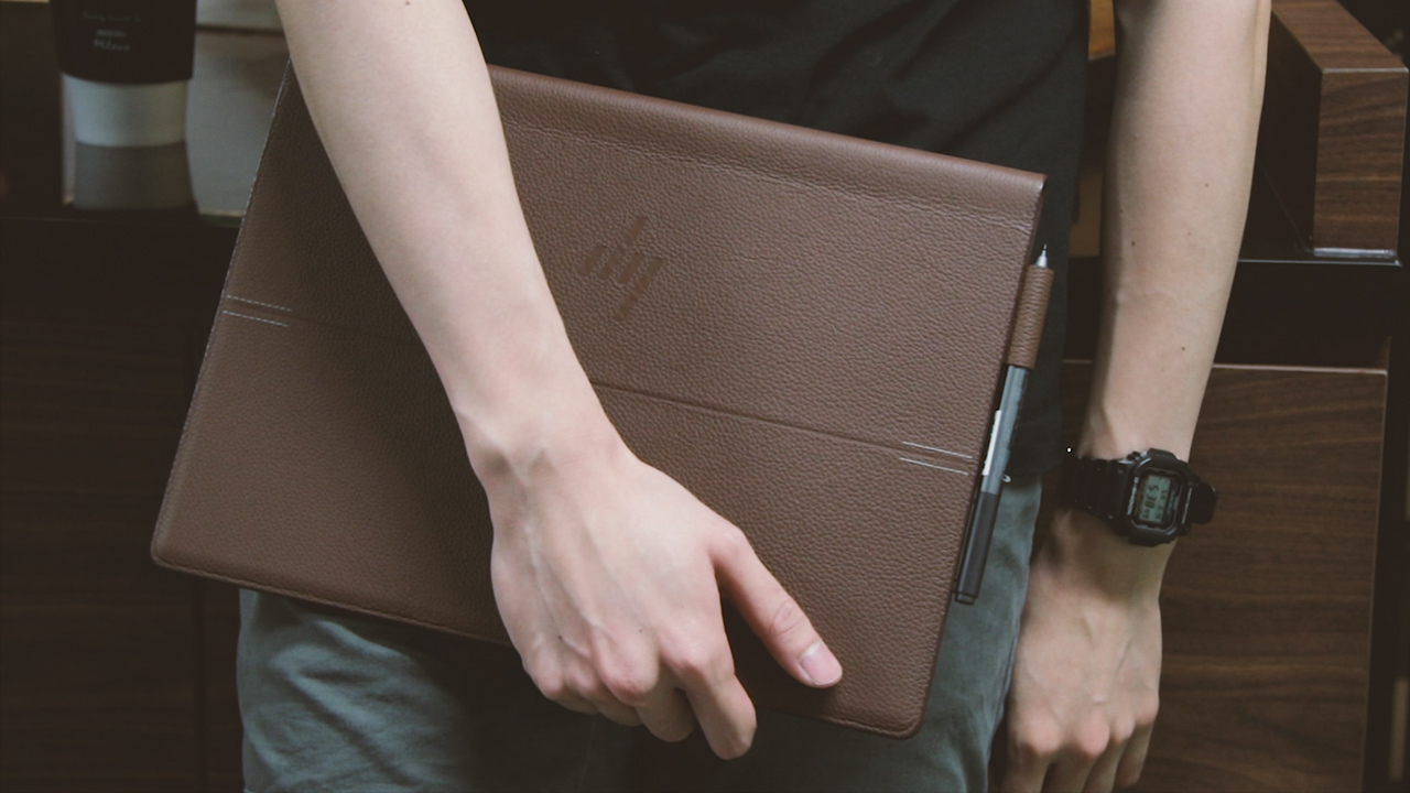 This hand-stitched leather laptop is also a convertible?